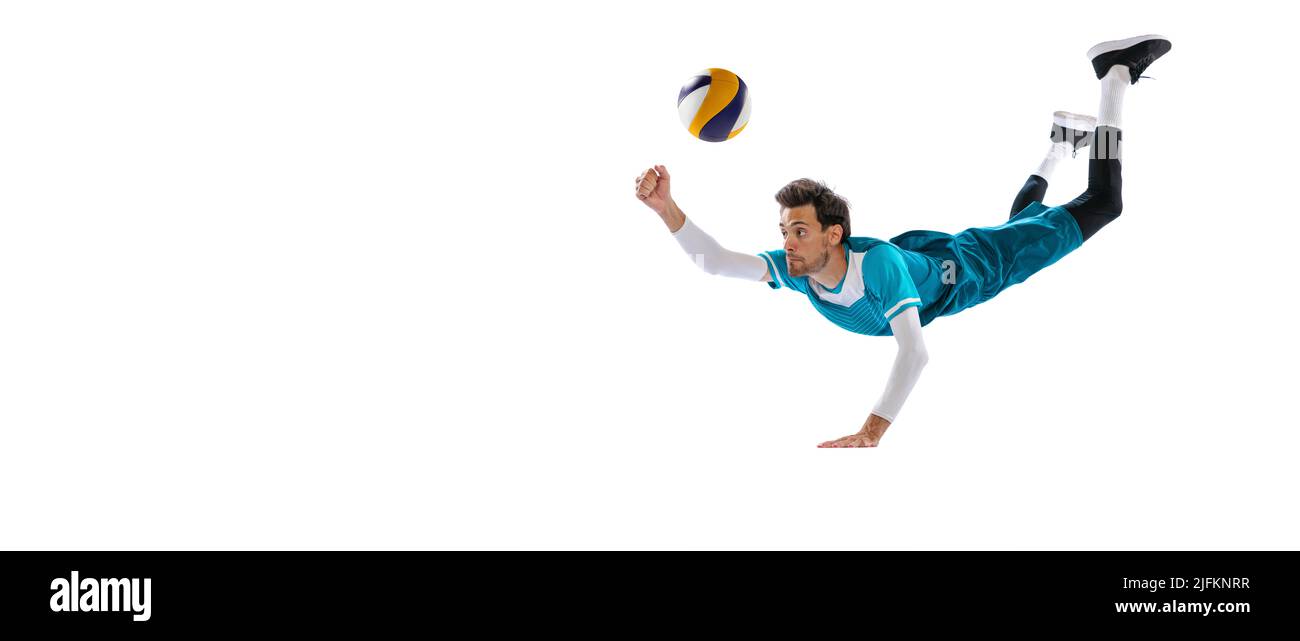 Portrait of young man, volleyball player in motion, training, playing ...