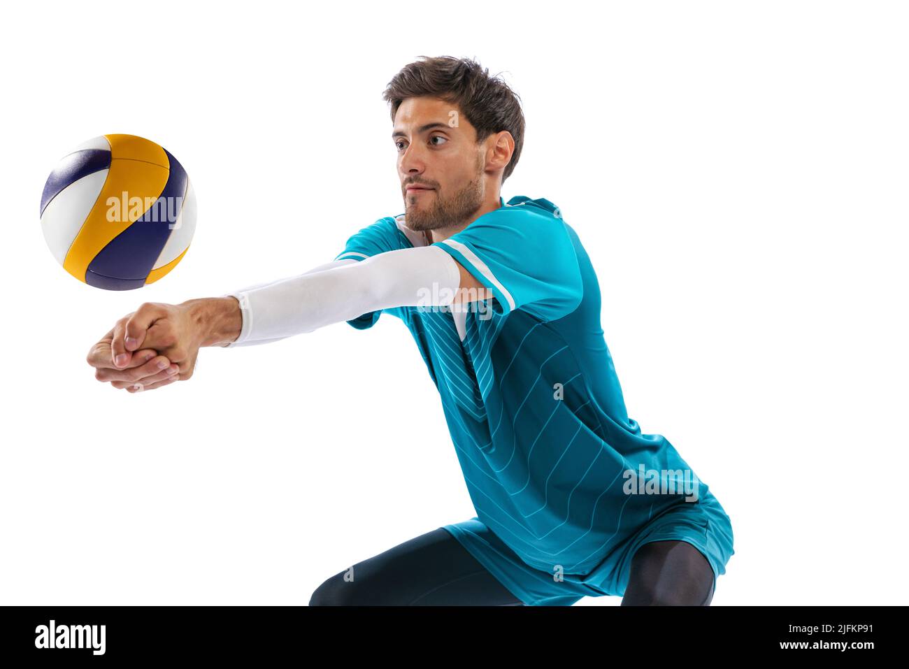 Portrait of young man, volleyball player in motion, training, playing ...