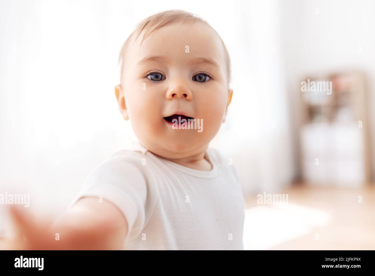 portrait or selfie of little baby at home Stock Photo - Alamy