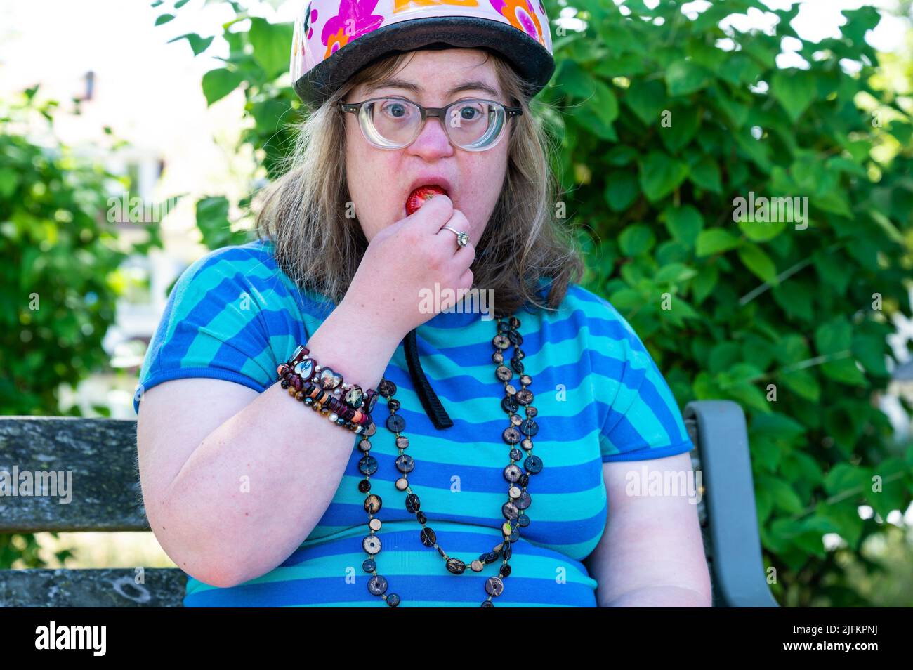 Portrait Of A 39 Year Old White Woman With The Down Syndrome Wearing