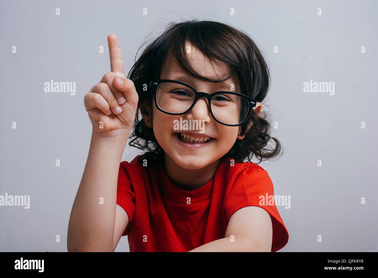 Child raising hand class hi-res stock photography and images - Alamy