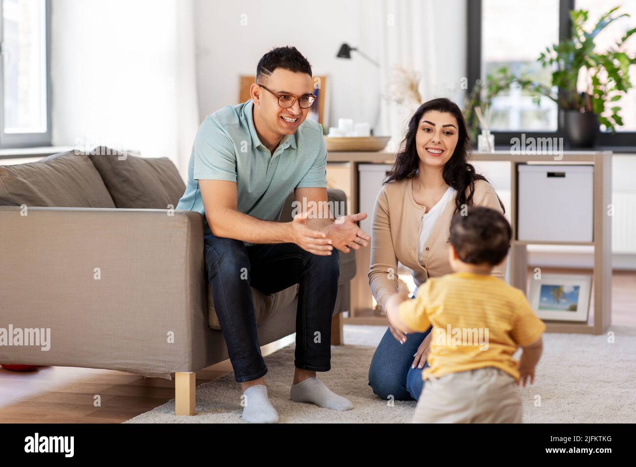 happy family with child at home Stock Photo - Alamy