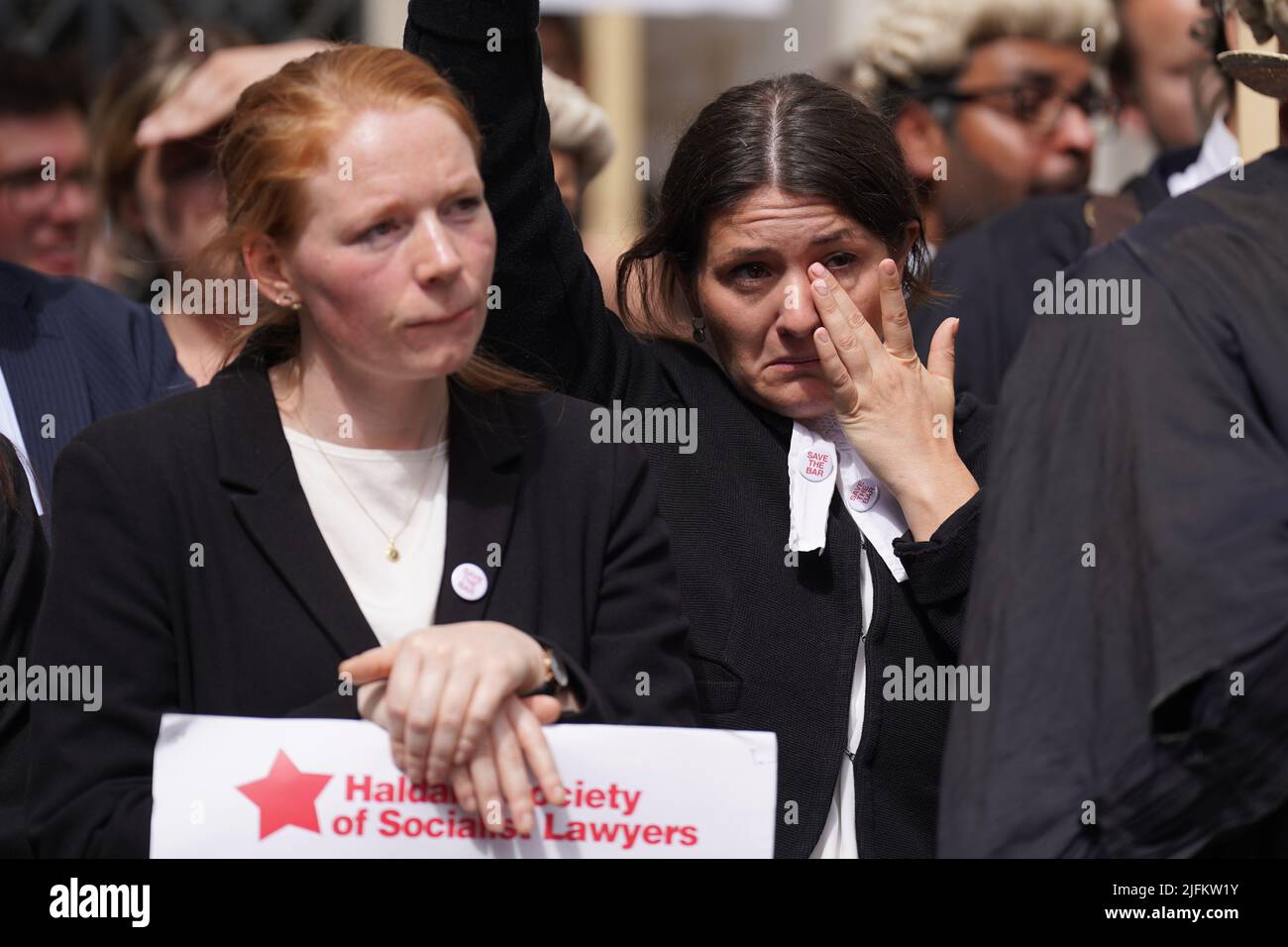 Criminal defence barristers gather outside the Royal Courts of Justice ...