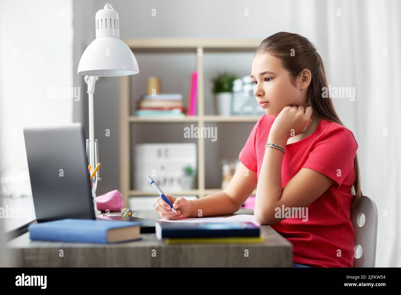 student girl with laptop computer learning at home Stock Photo - Alamy