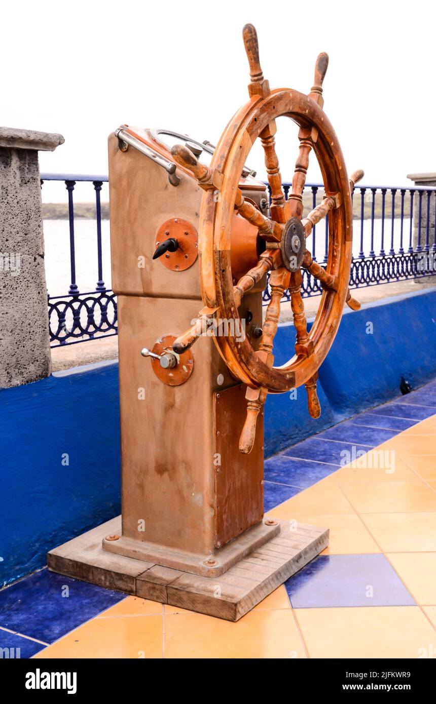 Old Vintage Wooden Helm Wheel near Blue Ovcean Stock Photo - Alamy