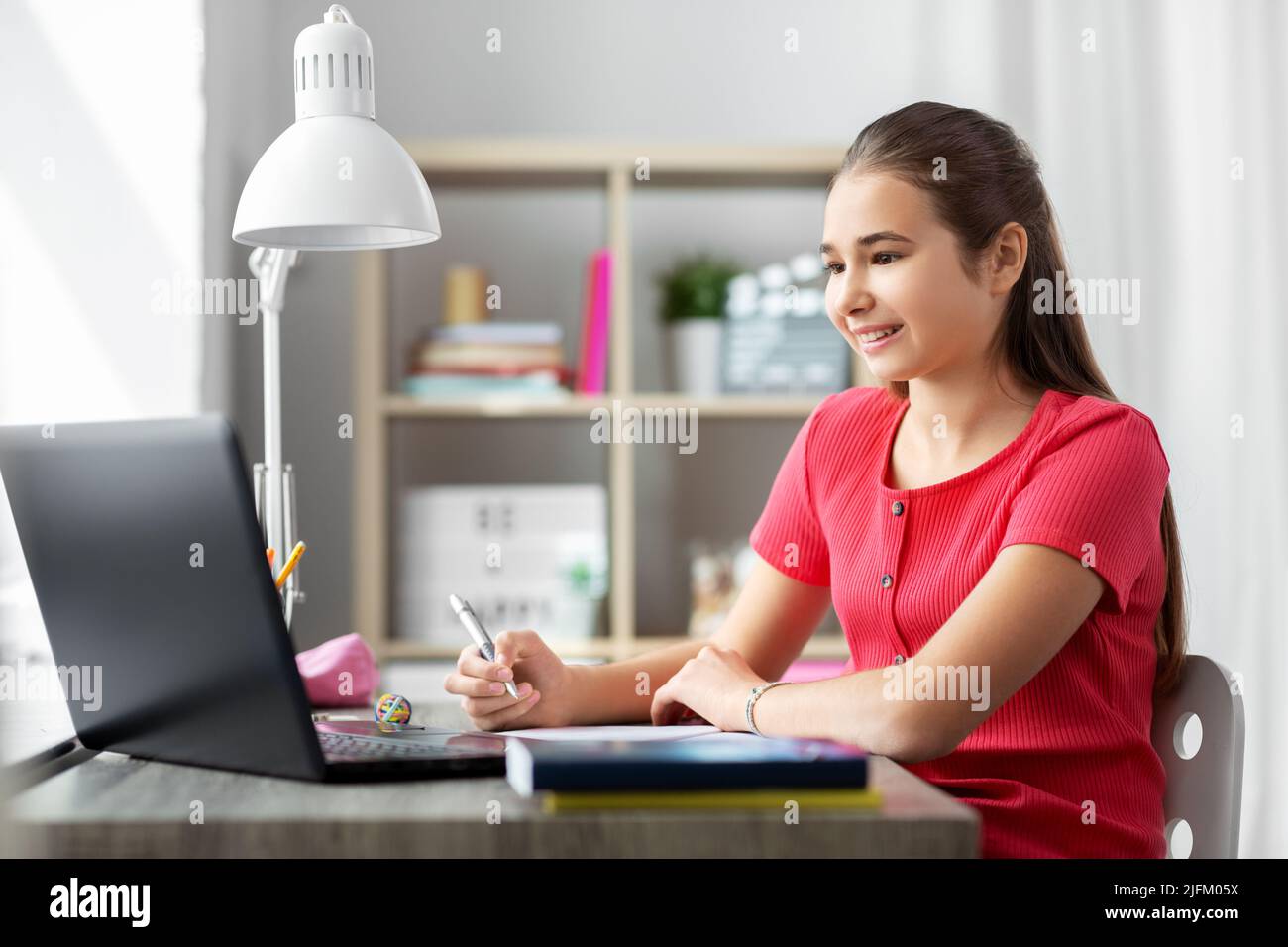 student girl with laptop computer learning at home Stock Photo - Alamy