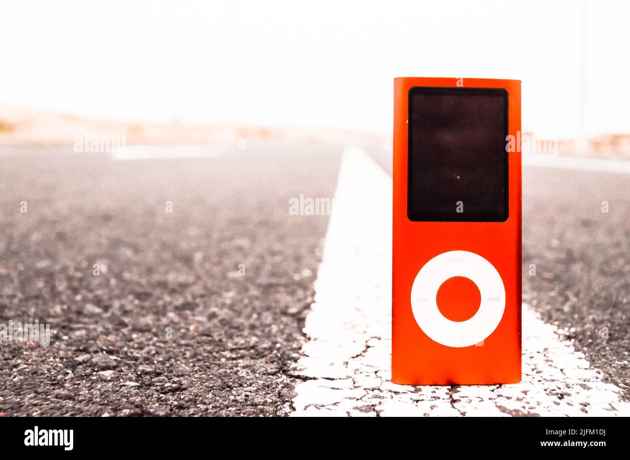 Vintage MP3 Music Player on an Asphalt Road Stock Photo - Alamy
