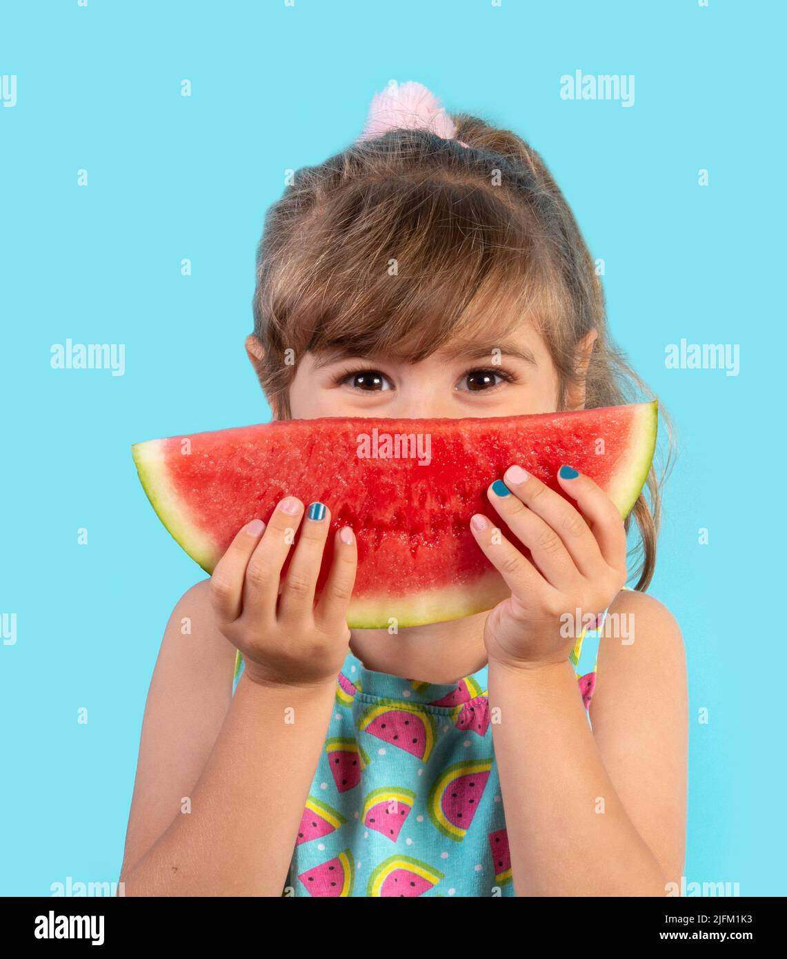 Girl eating watermelon hi-res stock photography and images - Alamy