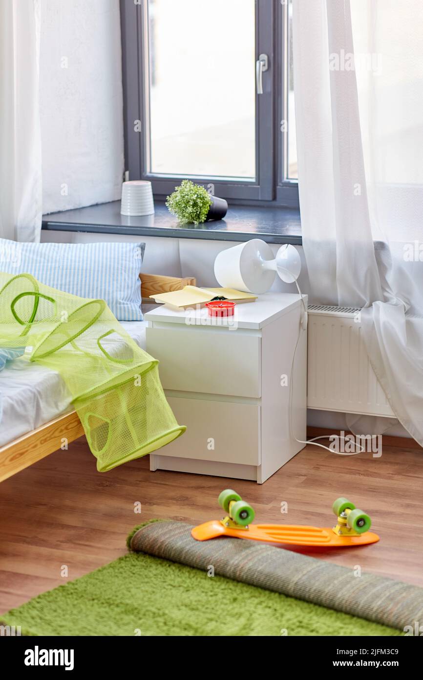 messy home or kid's room with scattered stuff Stock Photo - Alamy