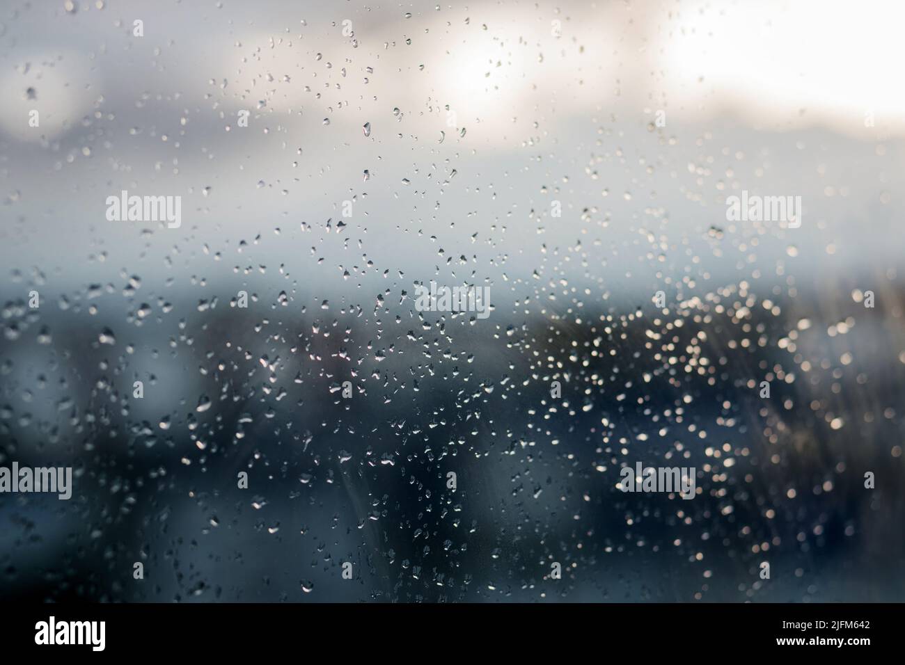 Raindrops on the transparent window. water drops on glass Stock Photo ...