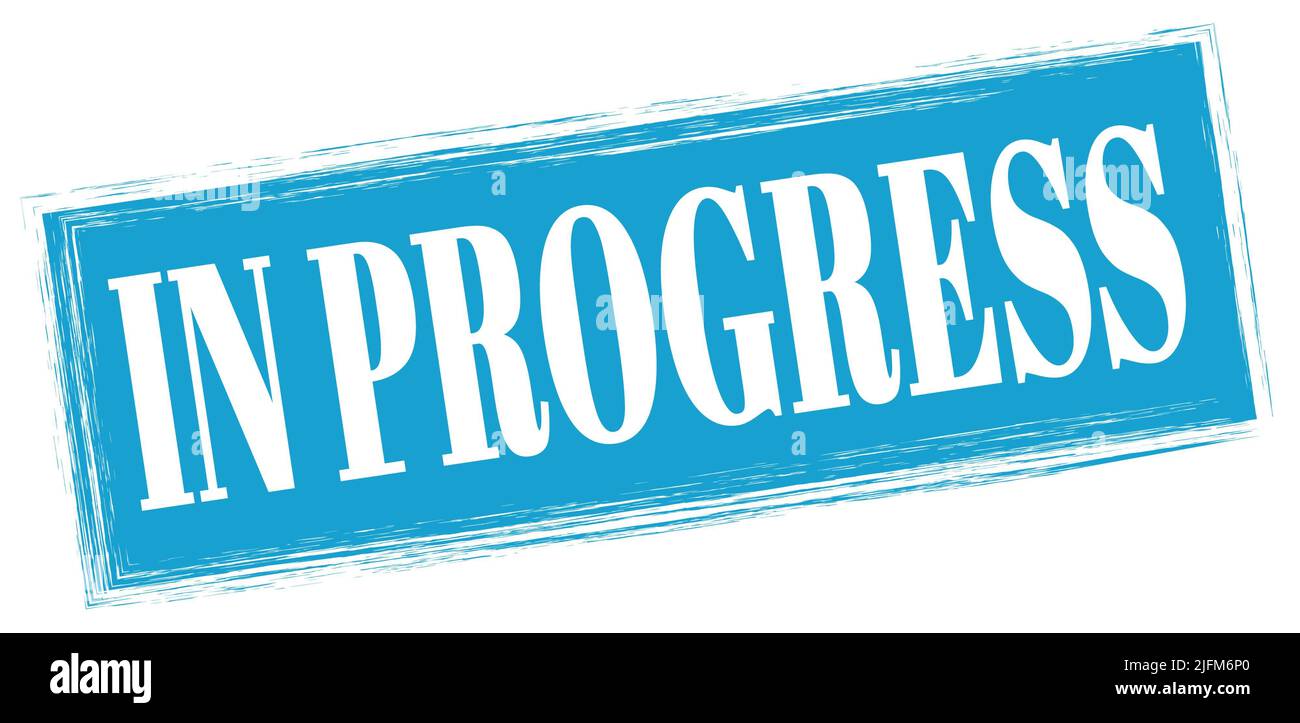 IN PROGRESS text written on blue rectangle stamp sign Stock Photo - Alamy