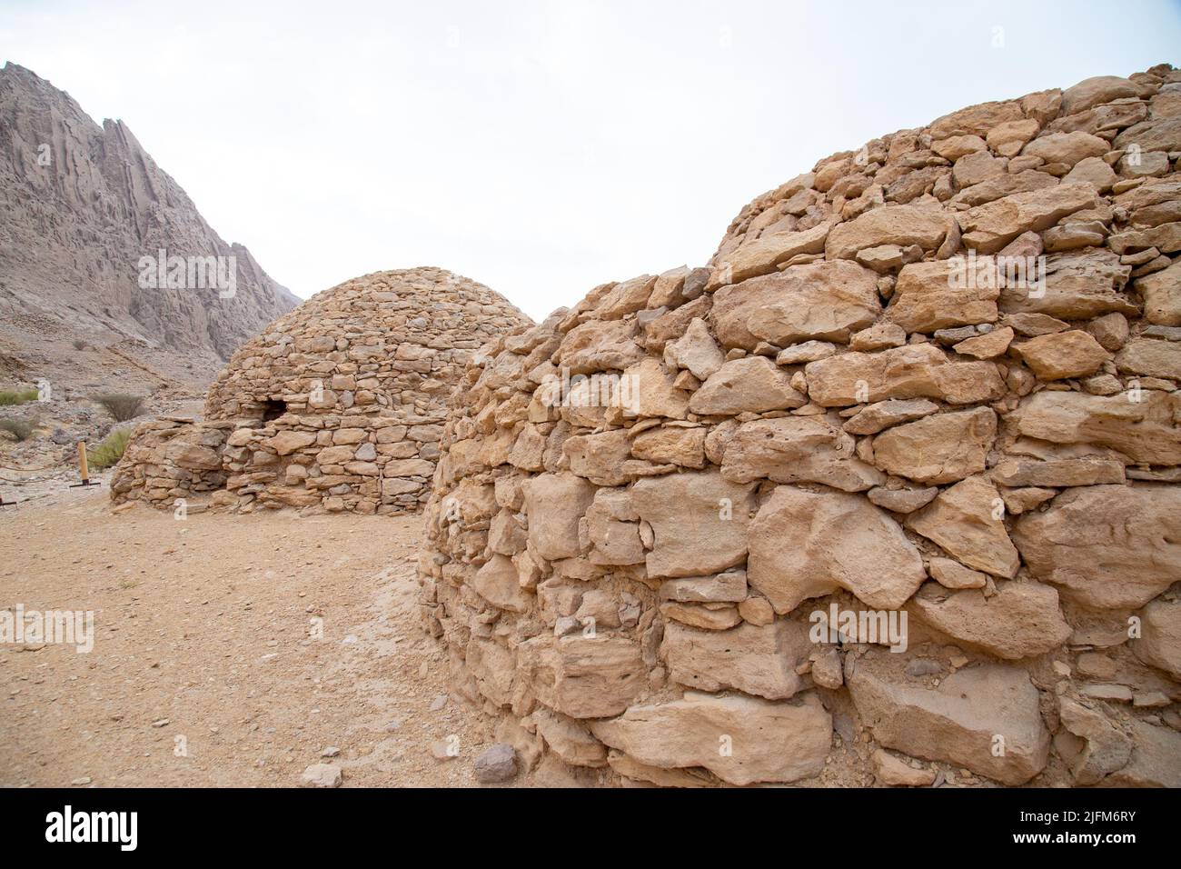 The historic Jebel Hafeet Beehive Tombs Stock Photo - Alamy