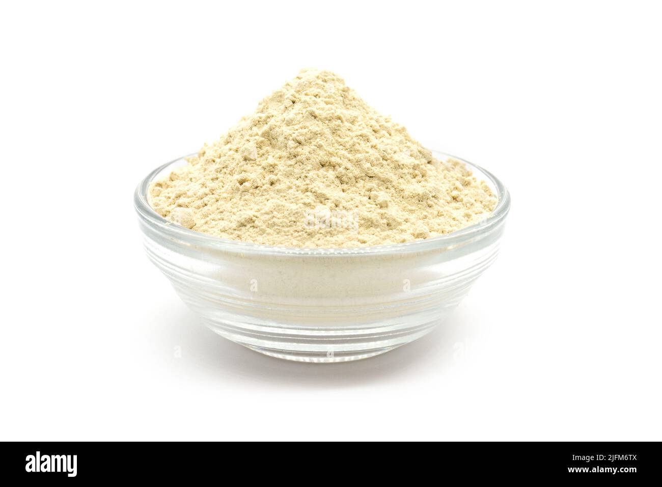 Yellow cosmetic clay in bowl Stock Photo - Alamy