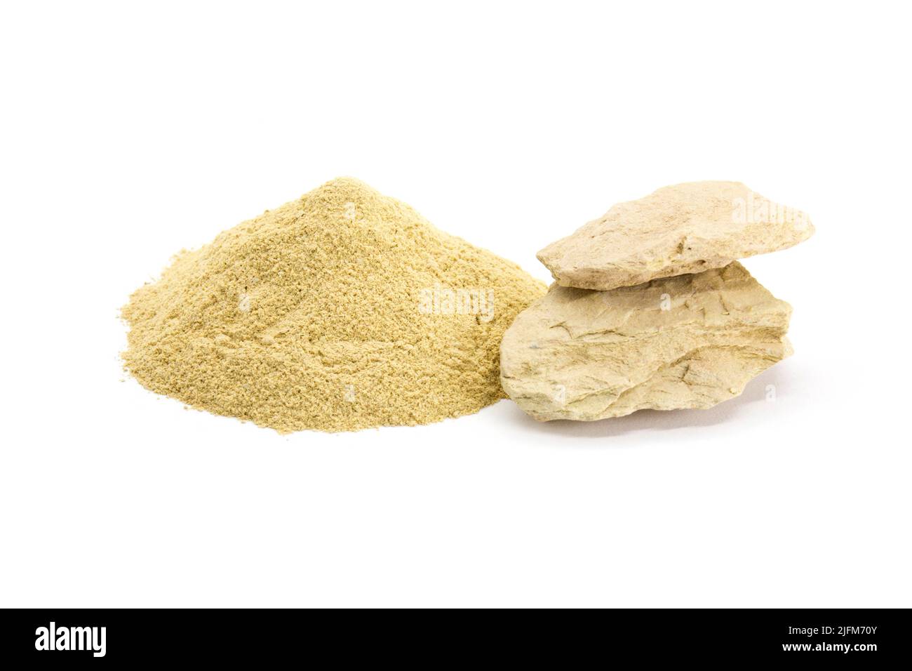 Yellow cosmetic clay in pieces and powder Stock Photo - Alamy