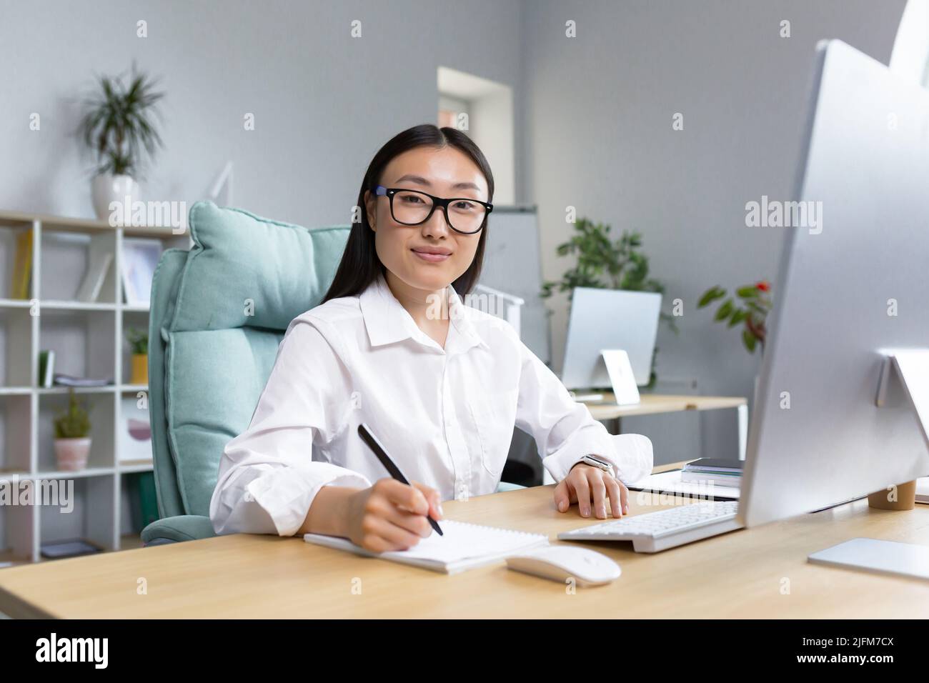 Portrait of young beautiful and successful Asian business woman, female ...