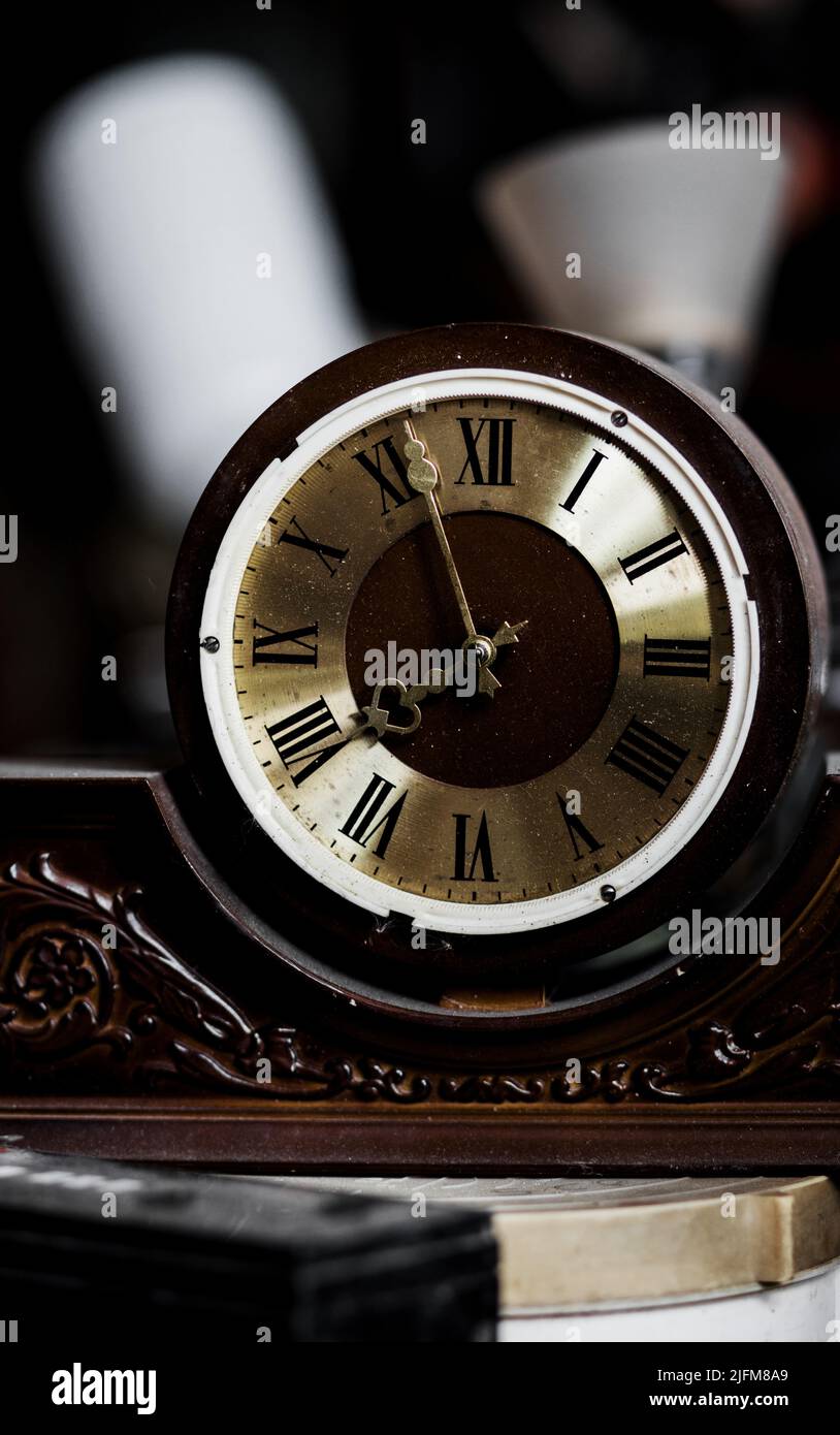 vintage table clock with roman dial. old antique classic clock. Concept ...