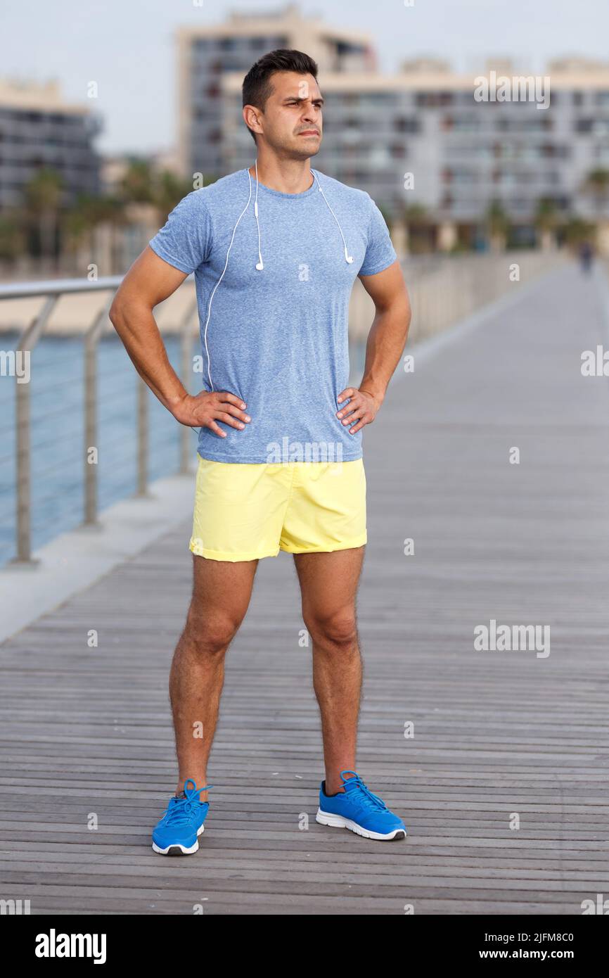 Sporty man posing outdoors Stock Photo - Alamy