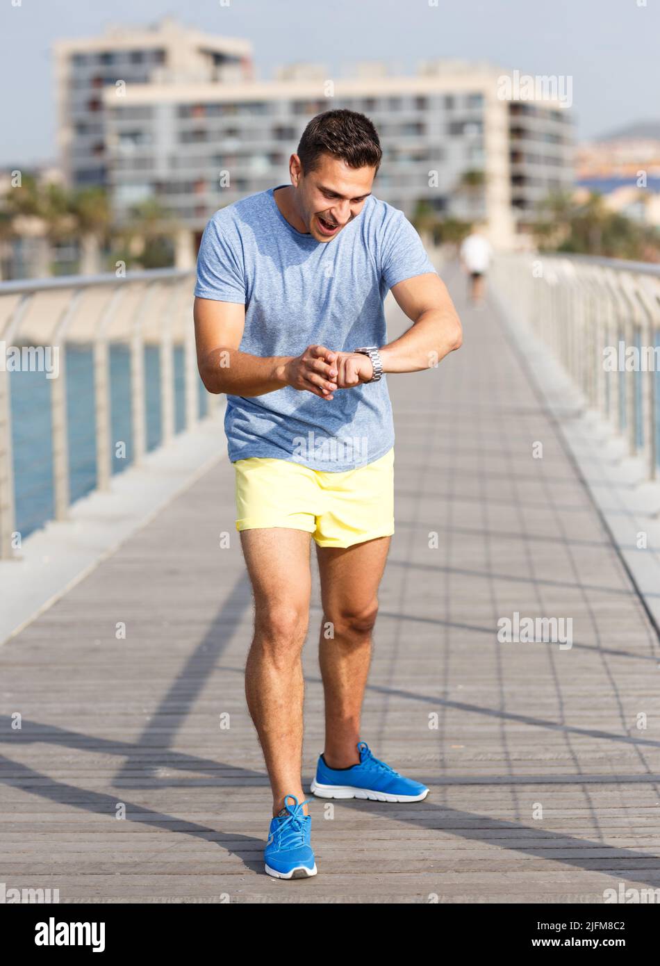 Man training with smartwatch Stock Photo - Alamy