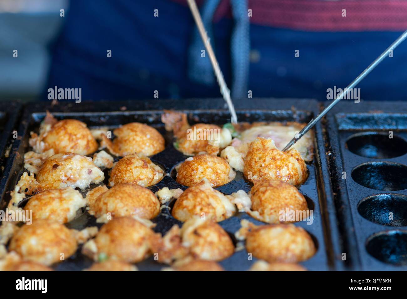 Cooking of Takoyaki Famous Japanese Snack Food or Octopus Ball Stock ...