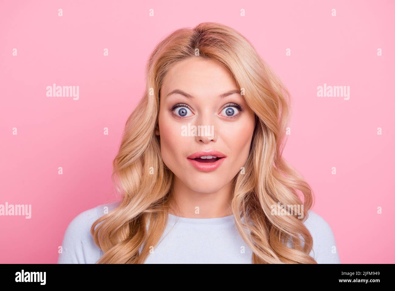 Portrait of satisfied glad person arms make roof above head toothy ...