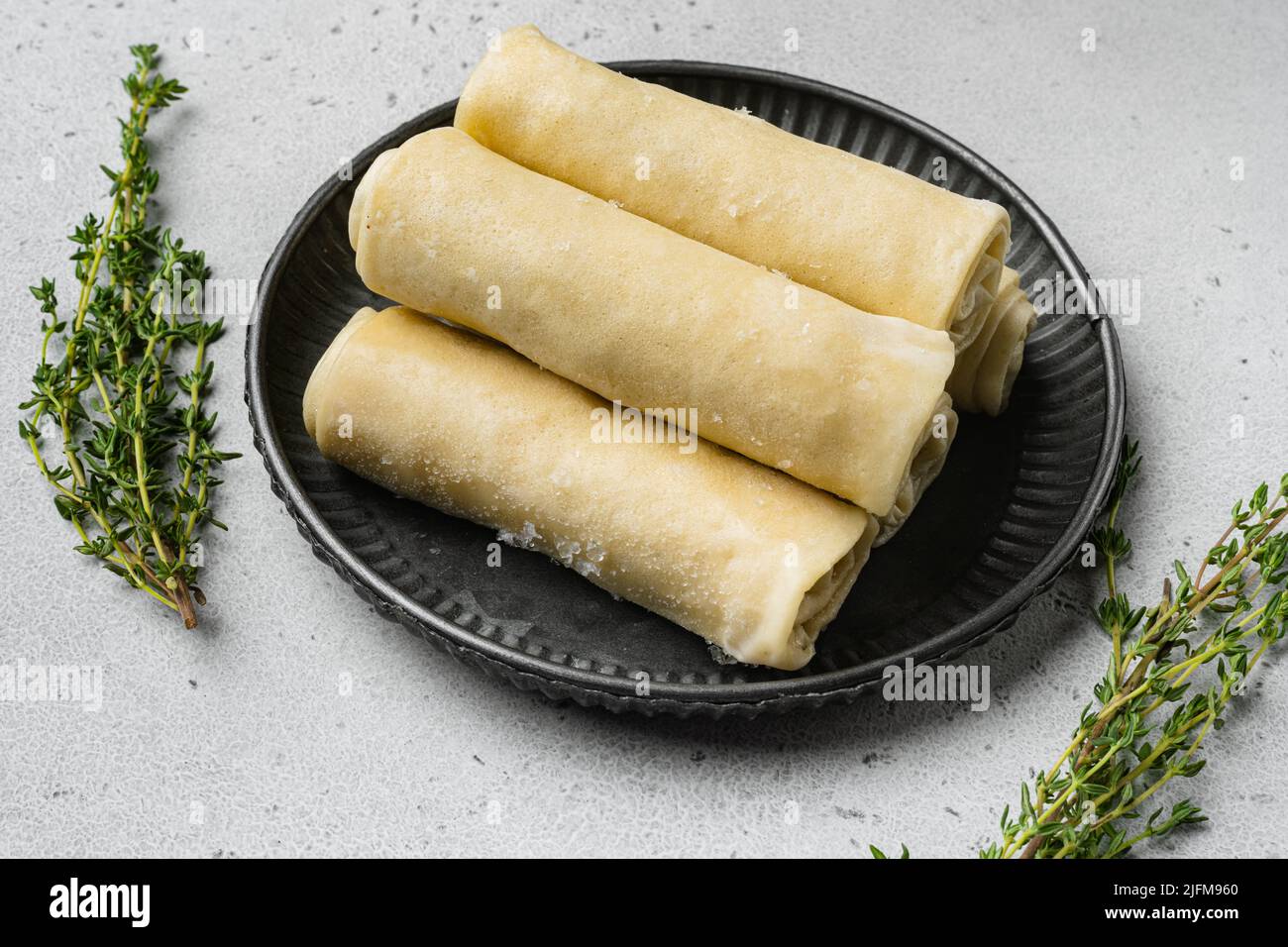 Crepes frozen on gray stone table background Stock Photo - Alamy