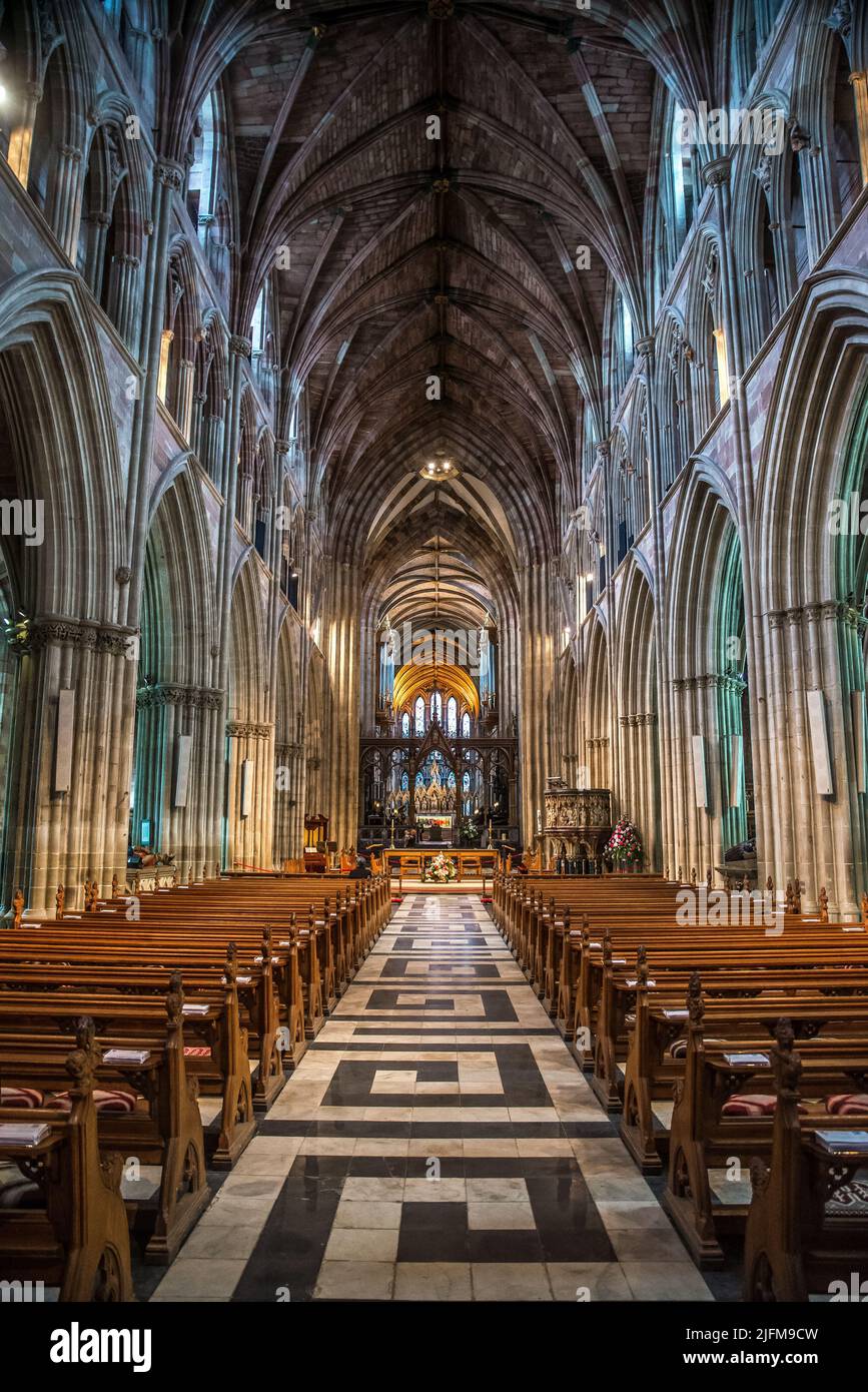 Interior of Worcester Cathedral looking down the center at the altar ...