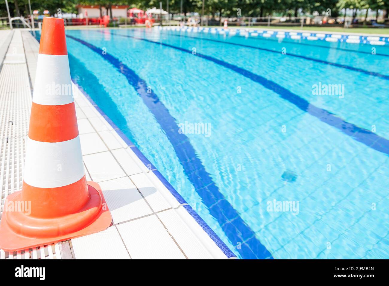 swimming pool repair - safety cone on edge Stock Photo - Alamy swimming pool repair - safety cone on edge Stock Photo - Alamy