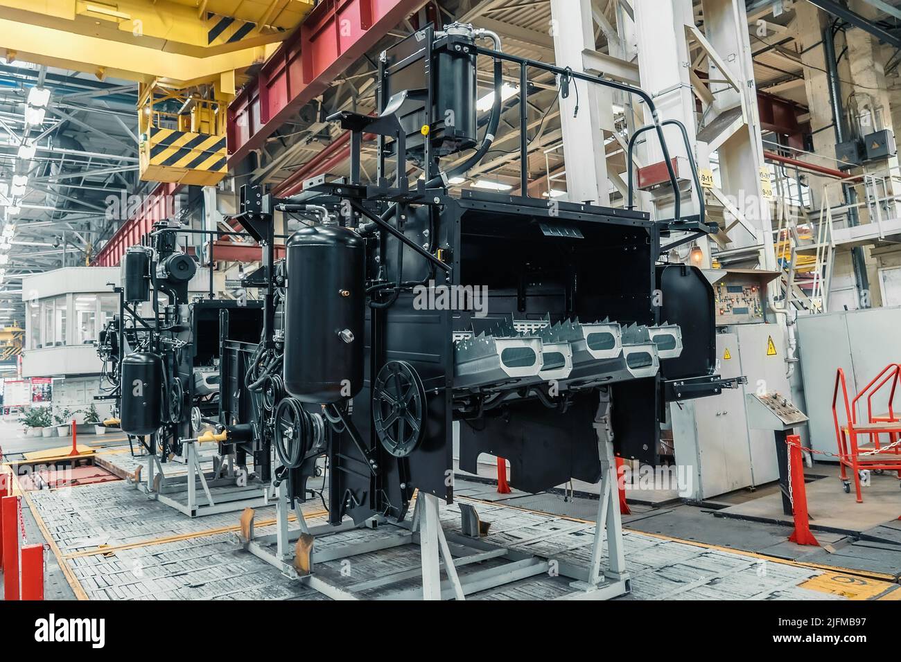 Parts of agricultural machine or combine harvester on factory assembly ...