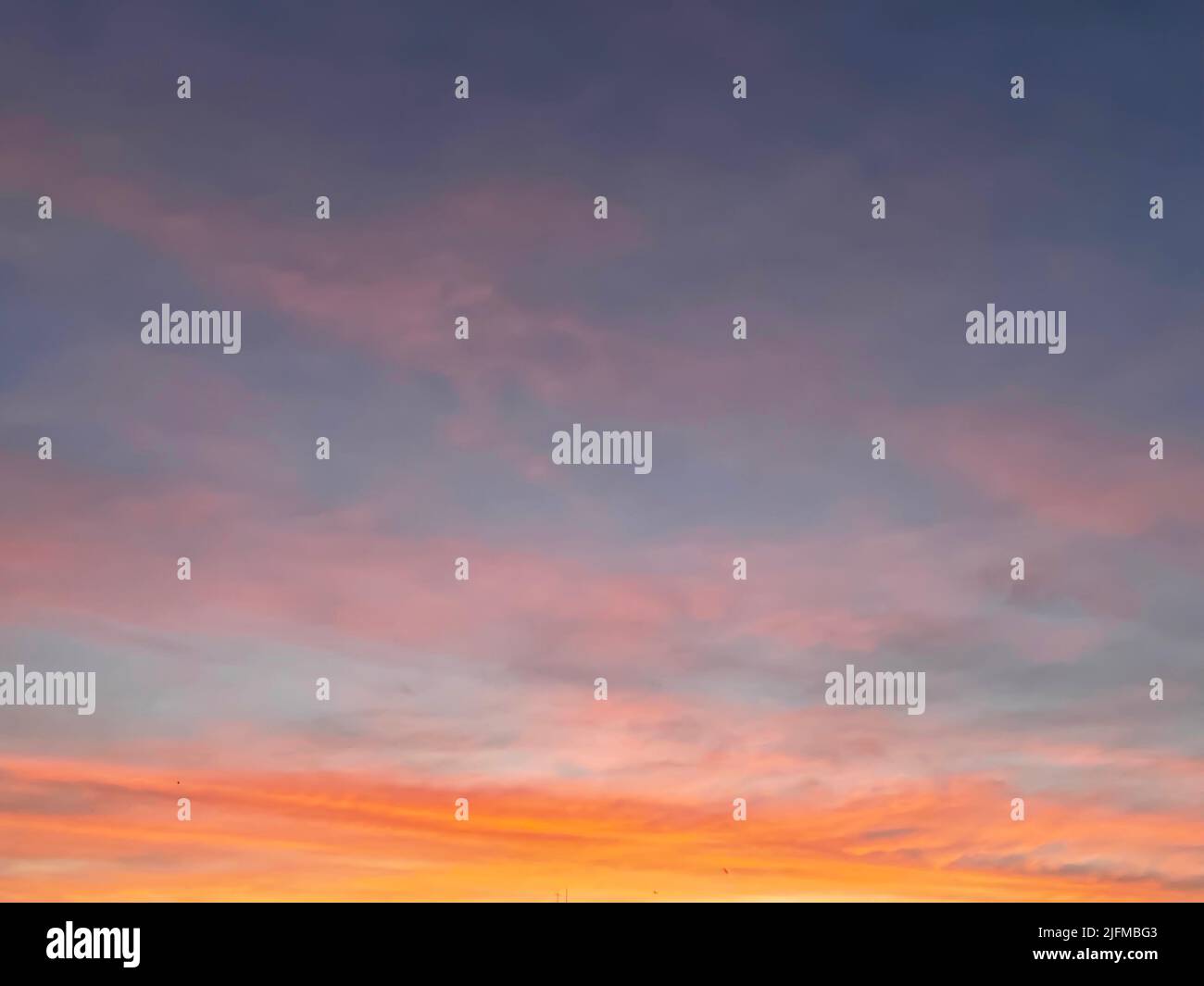 Sunset time colorful clouds hi-res stock photography and images - Alamy