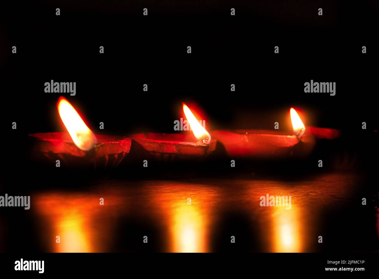 Diya lamp and oil lamp with fire and candles, color with wood grain for ...