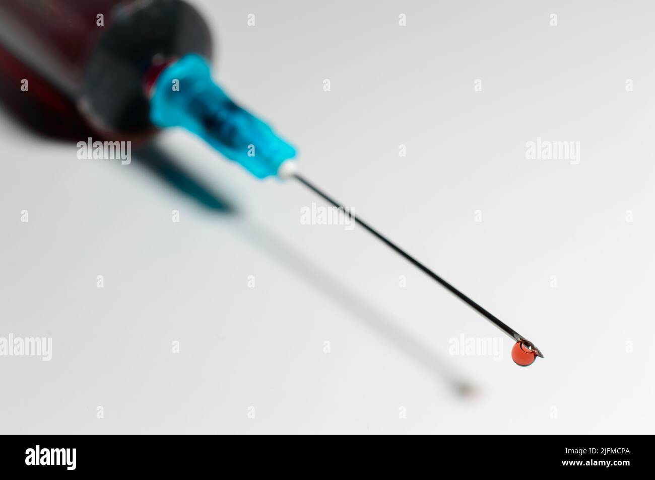 Dripping syringe hi-res stock photography and images - Alamy