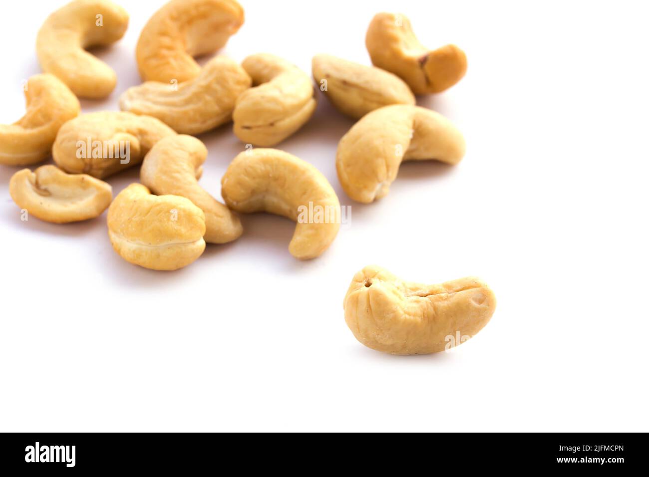 Close up cashews nut on a white background Stock Photo - Alamy