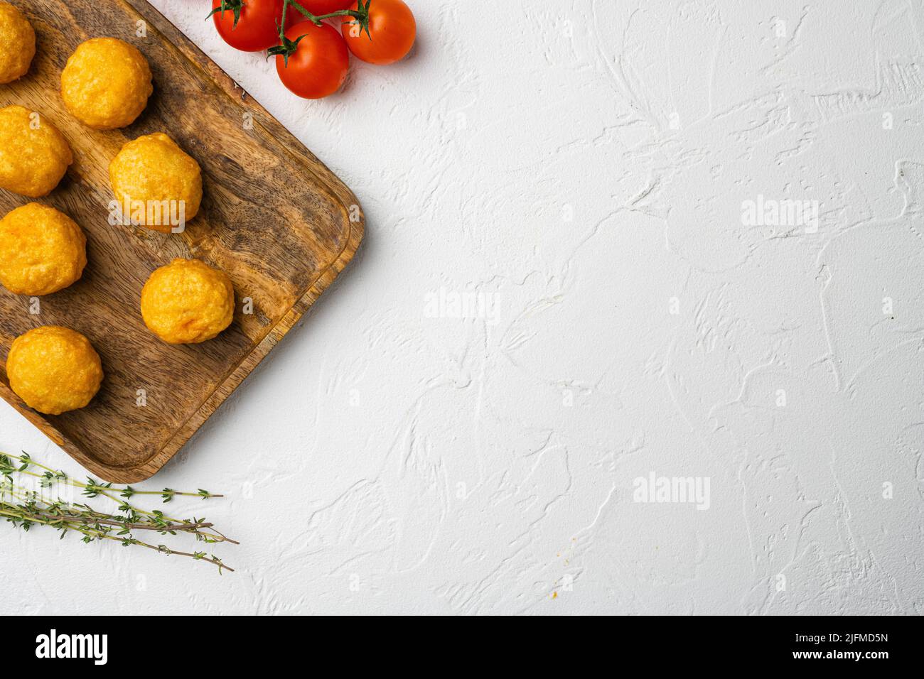 Breaded chicken fillet and batter on white stone table background, top ...