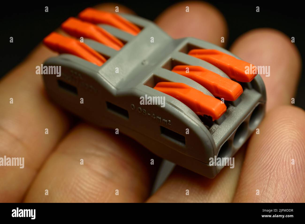 Hand with cables hi-res stock photography and images - Alamy