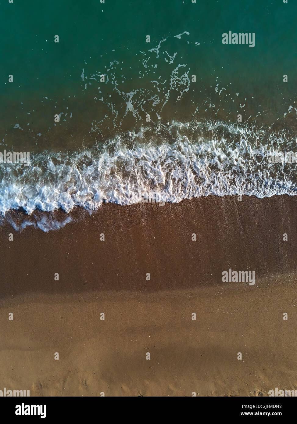 Aerial view of sandy beach and sea with waves, Top view, amazing nature ...