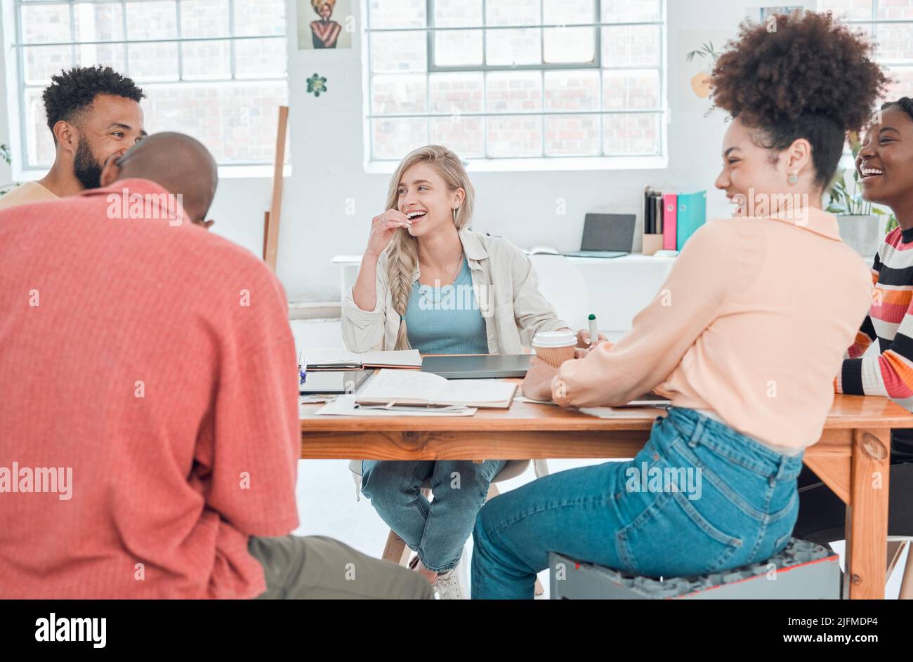 Group work colleagues sitting table hi-res stock photography and images ...