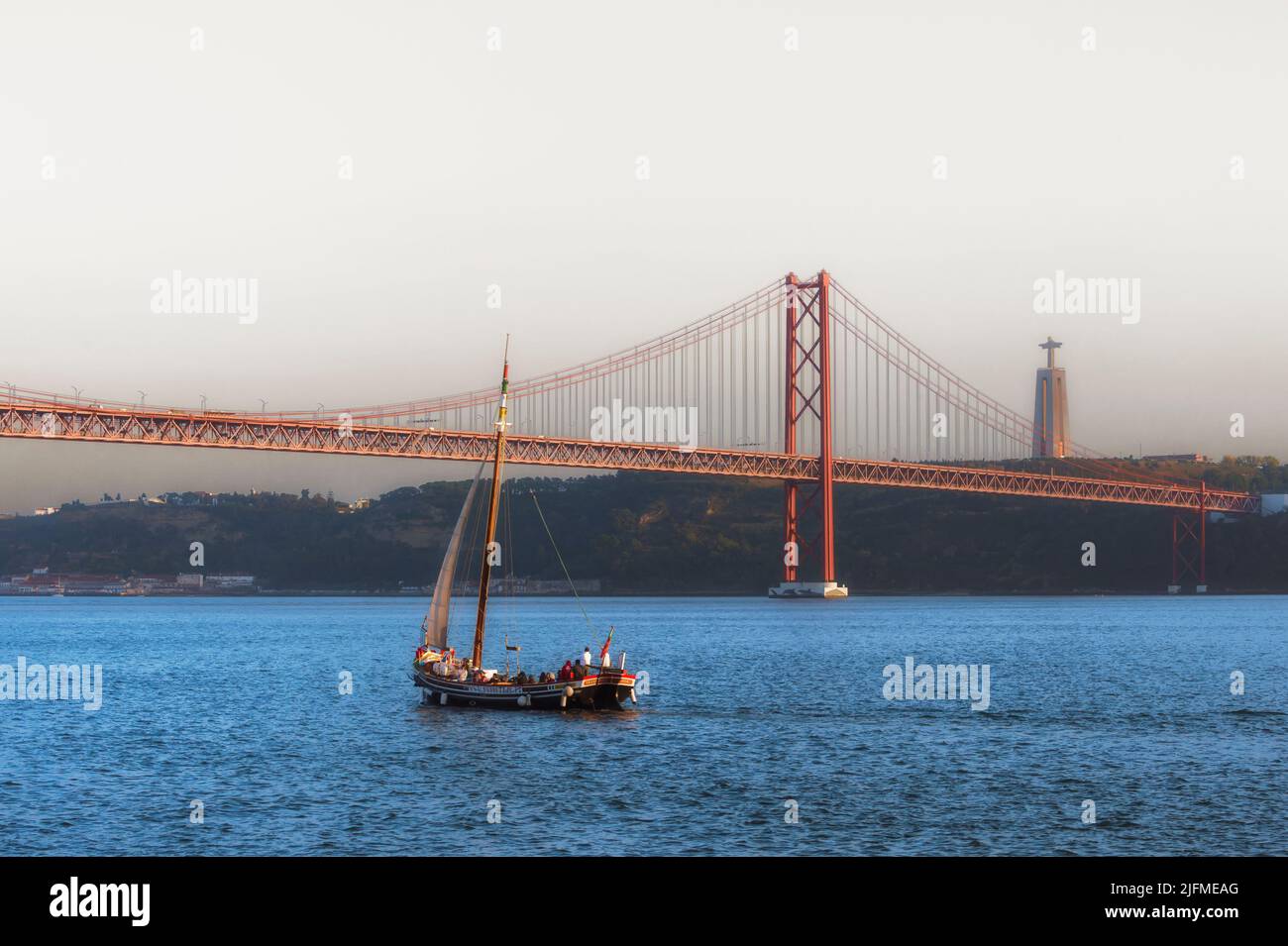 Bridge of 25 April and Almada Cristo Rei statue Belem district, Lisbon ...