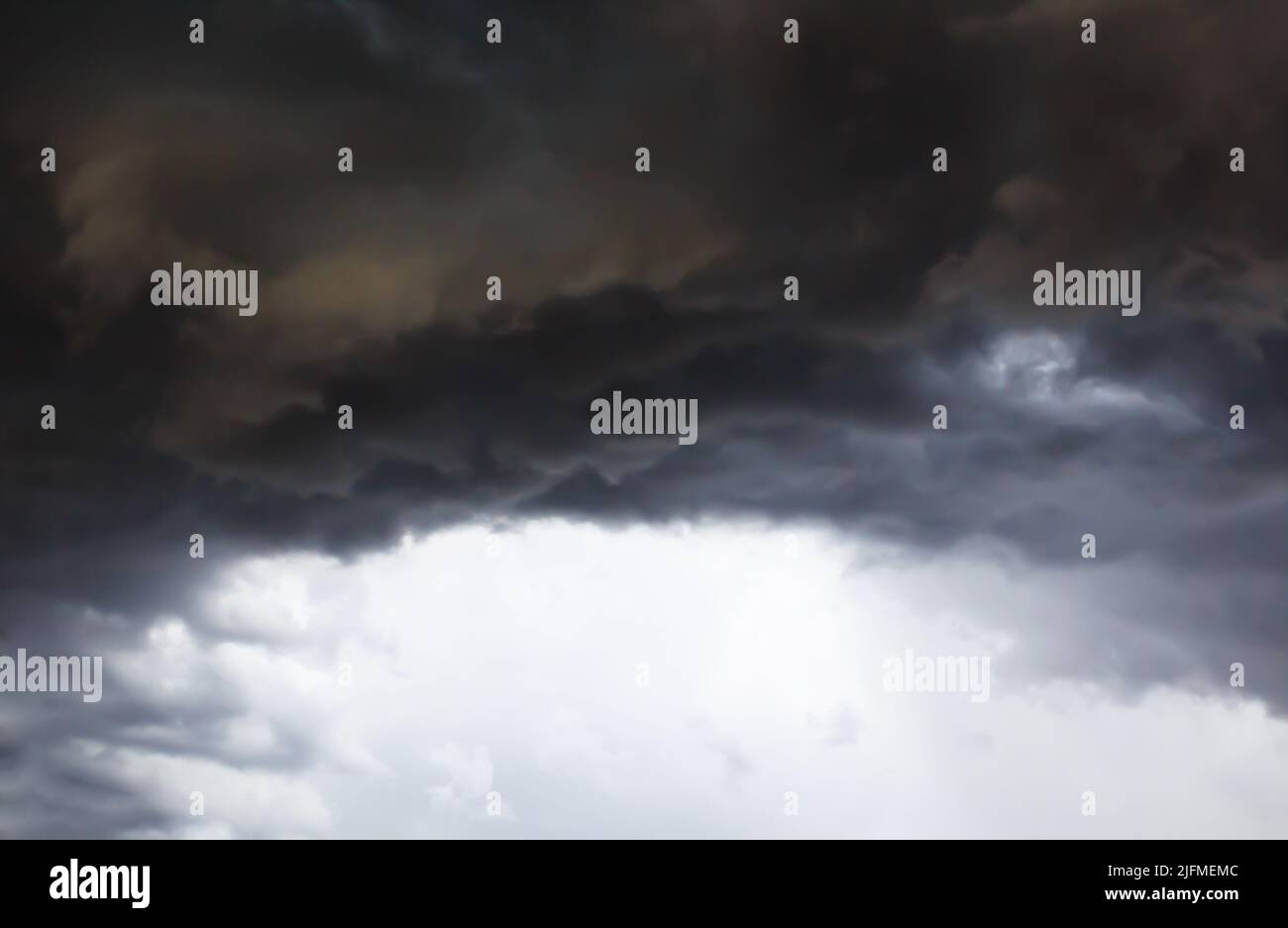 Dark storm clouds before rain, with strange cloud shapes. Storm clouds ...