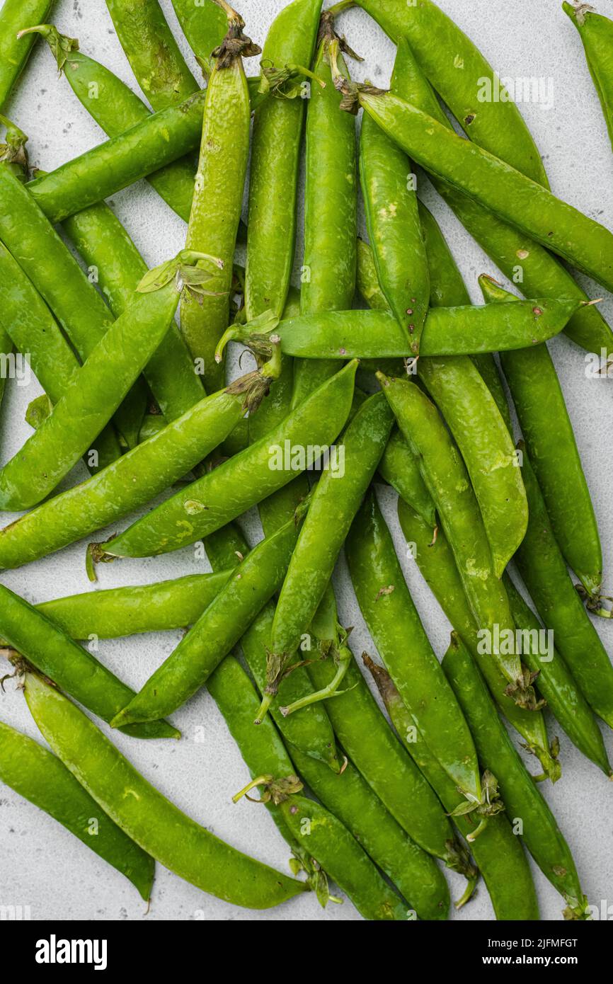 Pods of green peas , top view flat lay Stock Photo - Alamy