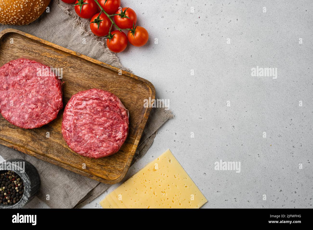 Organic raw ground beef, round patties for making homemade burger on ...