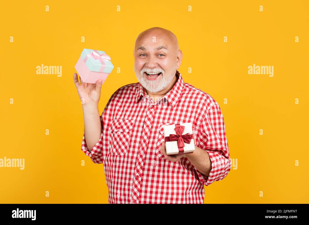 cheerful senior man with present box for anniversary Stock Photo - Alamy