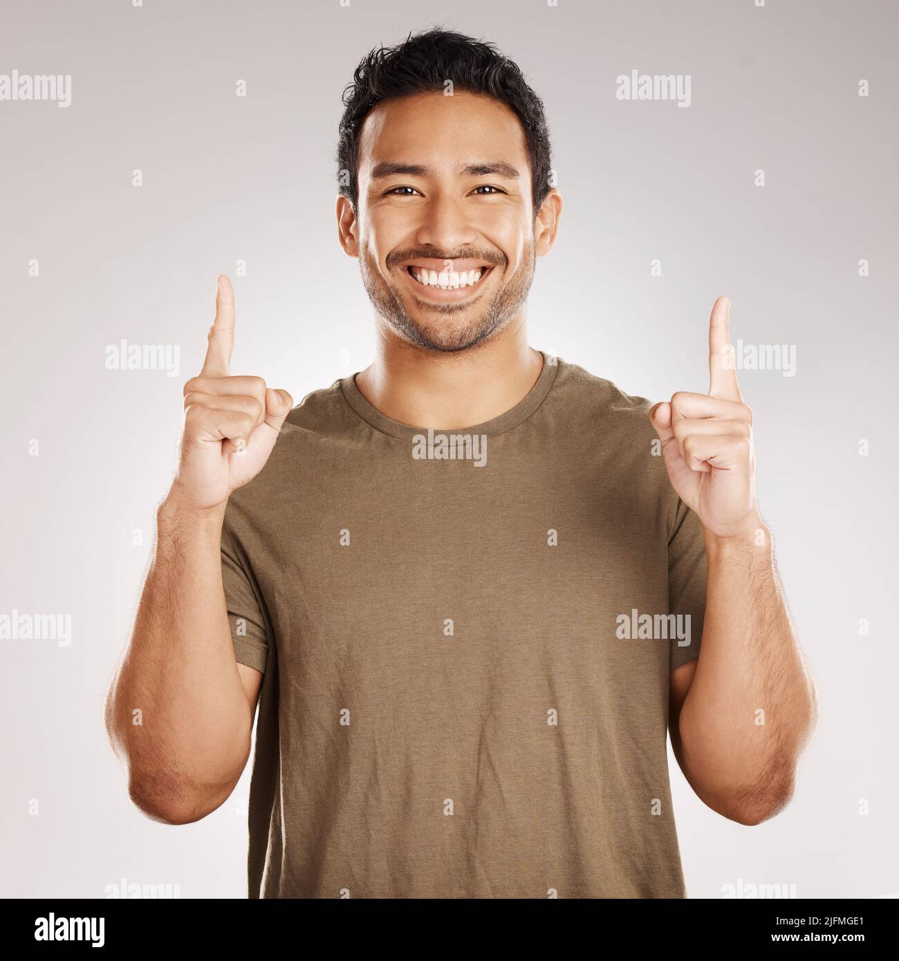 Handsome happy young hispanic man hi-res stock photography and images ...