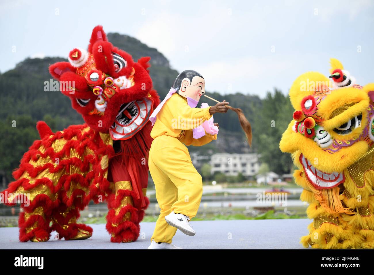 QIANXINAN, CHINA - JULY 4, 2022 - People perform a lion dance at ...
