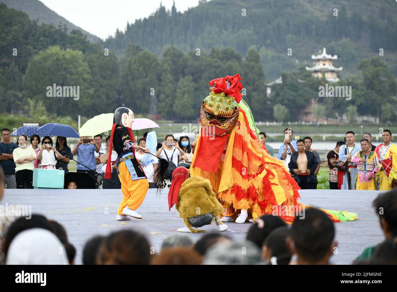 QIANXINAN, CHINA - JULY 4, 2022 - People perform a lion dance at ...