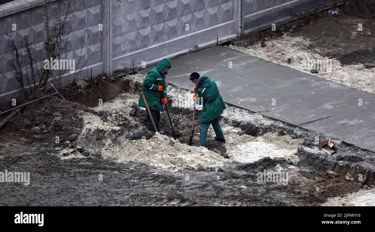 Kiev, Ukraine December 17, 2020: Workers are assembling a concrete ...