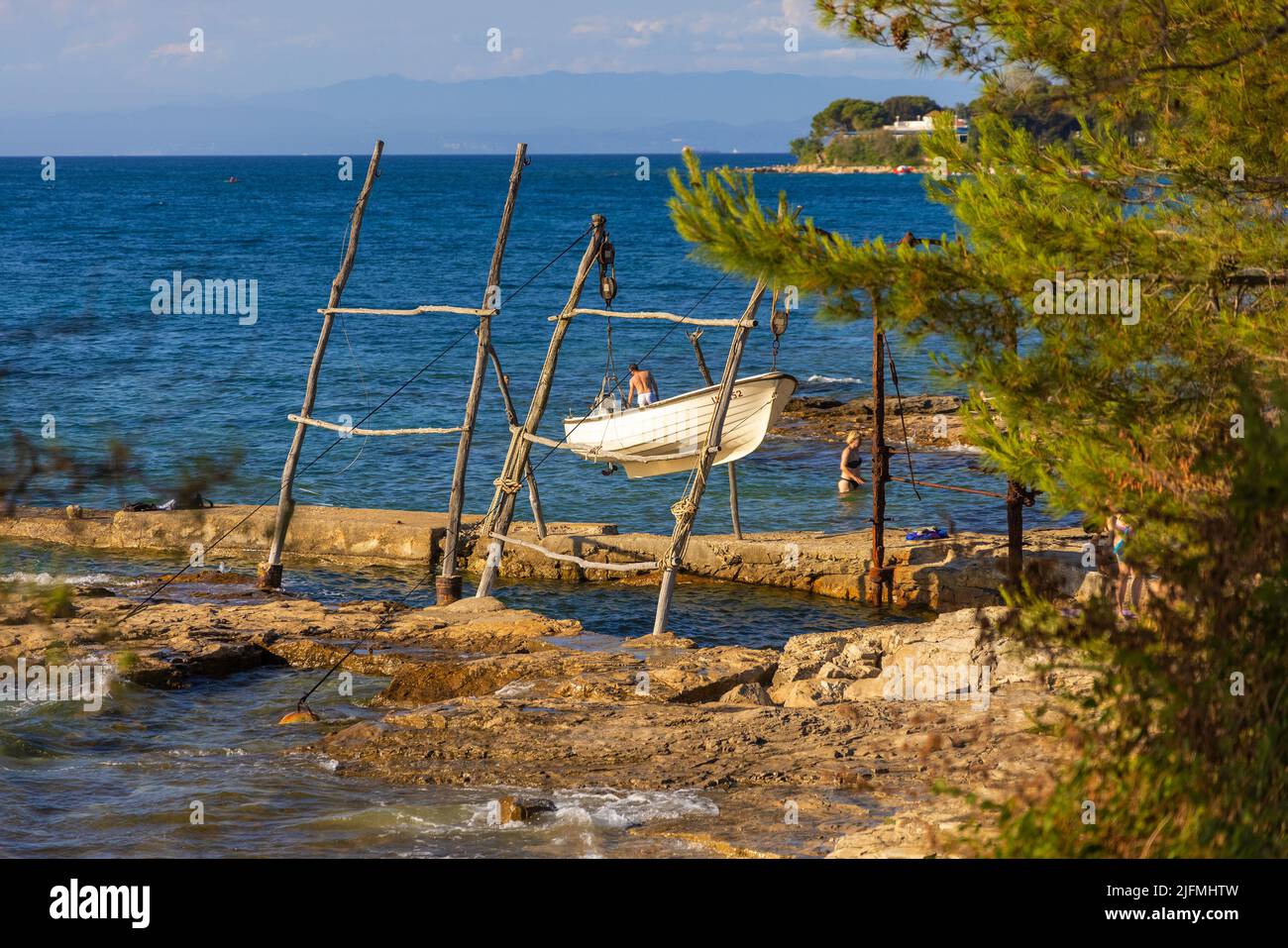 Hanging boats hi-res stock photography and images - Alamy