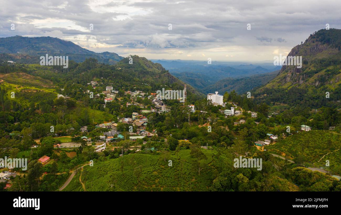 The town of Ella is surrounded by green hills with tea plantations and ...