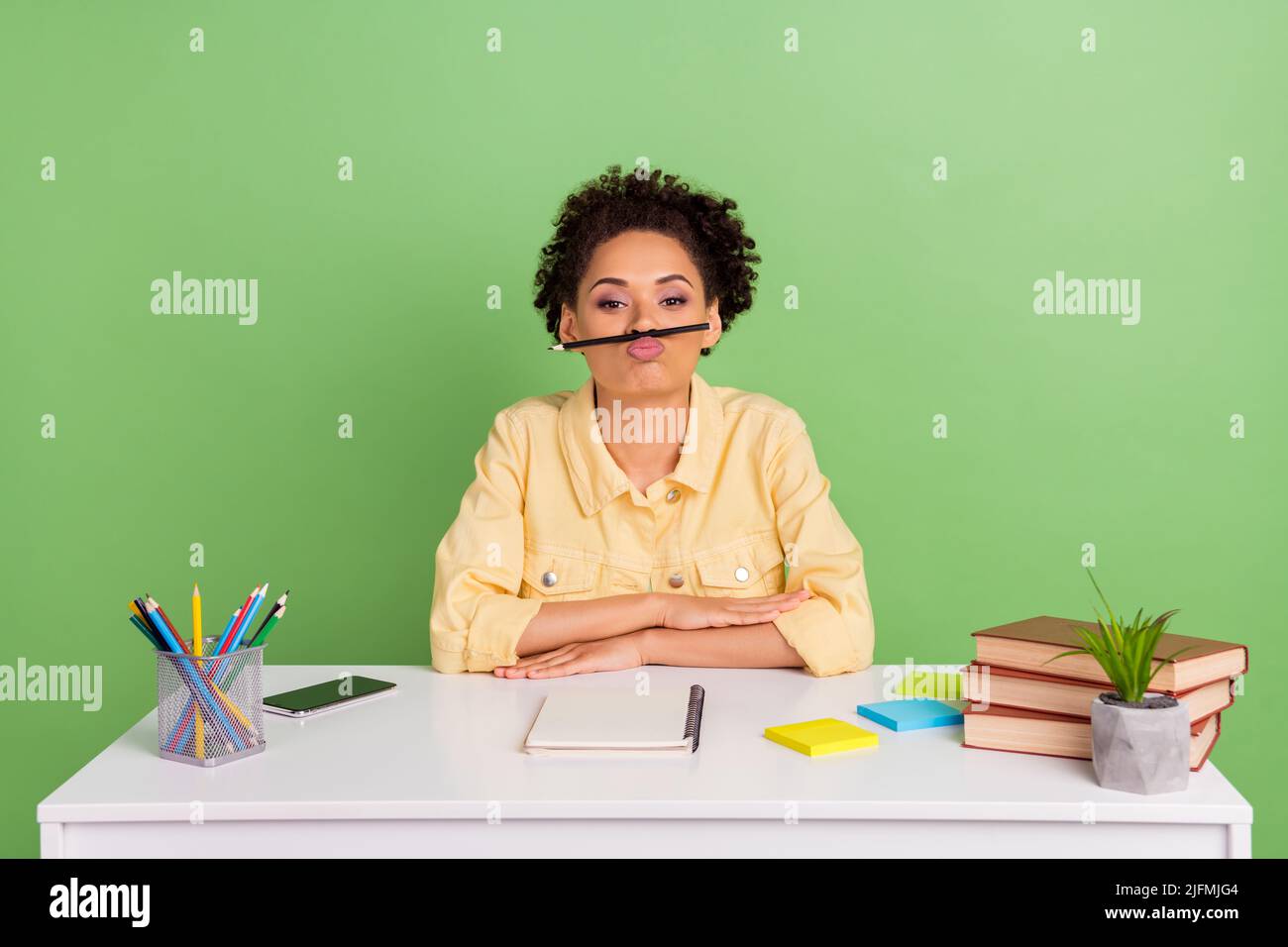 Photo of funny millennial brunette lady play wear yellow shirt isolated ...