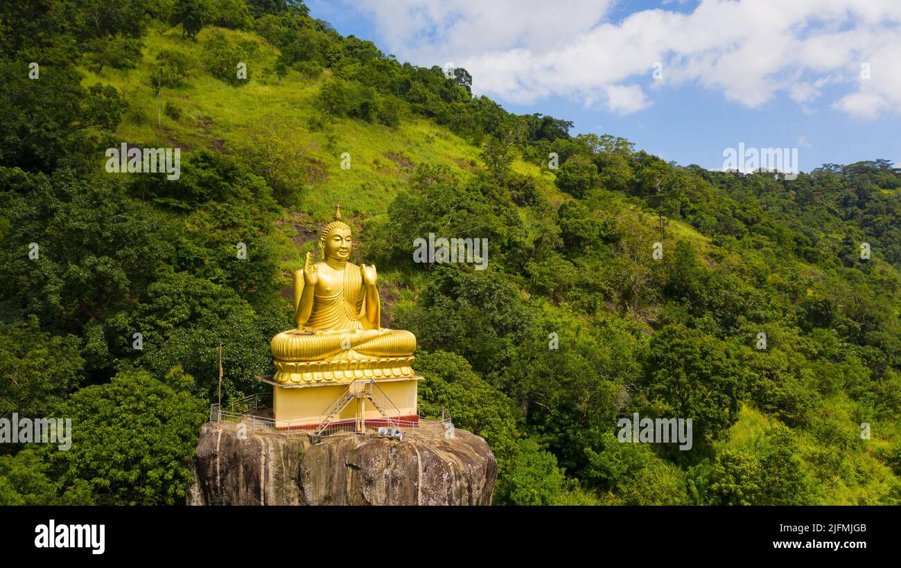 Buddha statue at a hill slope near Aluvihare Rock Temple. Aluvihara ...