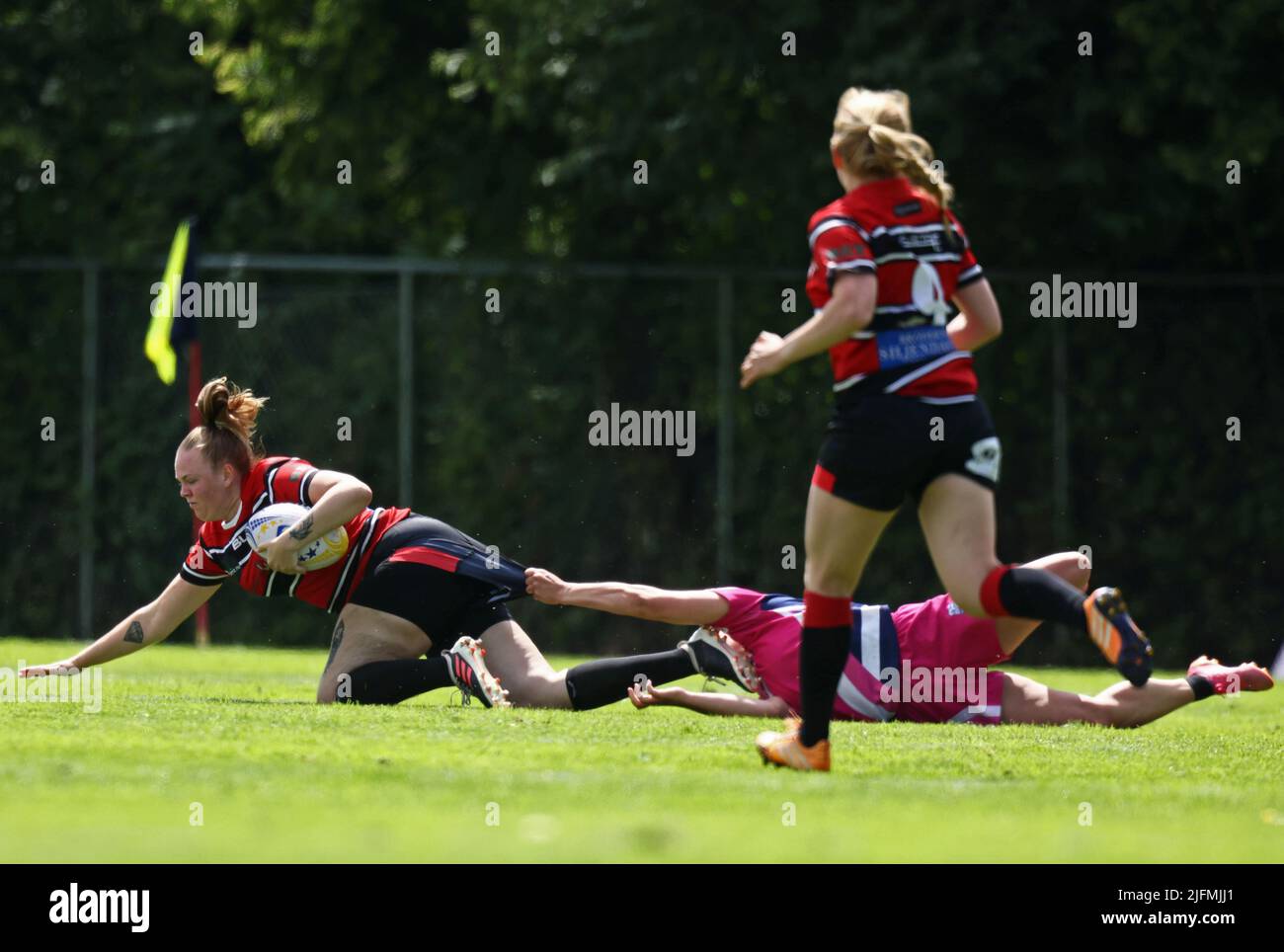 Female rugby players in action hi-res stock photography and images - Alamy